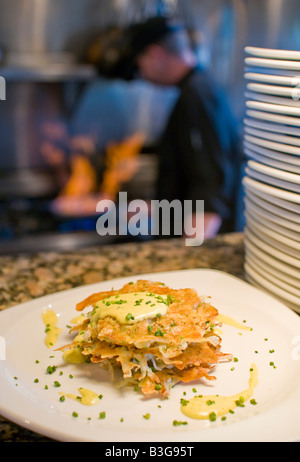 A cook prepares a meal at a nice restaurant Stock Photo - Alamy
