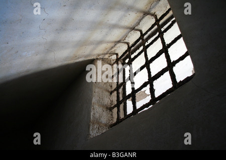 one high dark prison cell window with metal bars Stock Photo - Alamy
