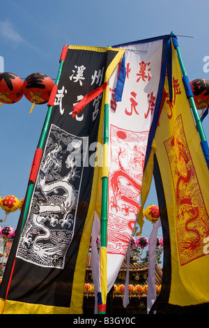 Chinese Taoist religious flags against a blue sky Zhenlan Temple, Dajia ...
