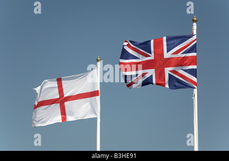 The Union Jack and St George's flag flying in front of The Tower of ...
