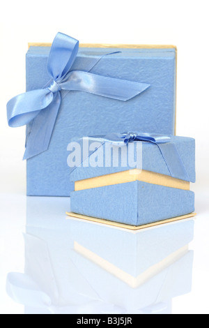 Cyan gift boxes on white background Stock Photo - Alamy