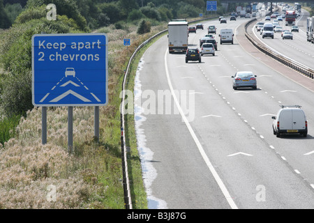 Keep apart 2 chevrons motorway road markings on M56, Cheshire,UK Stock ...