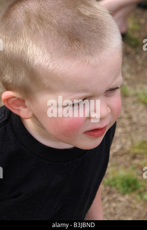 Cute baby with rosy red cheeks Stock Photo - Alamy