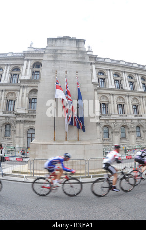 road racers from different teams passing the cenotaph in london during stage 1 of the tour of ...