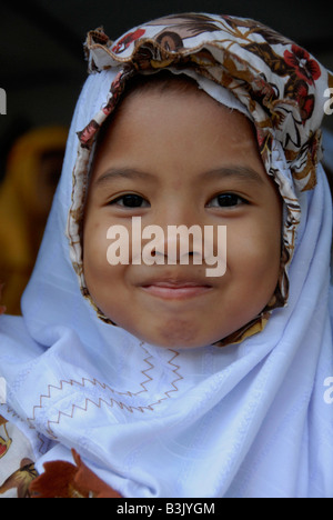 young girls in kuta slum , muslim school, looking happy , kuta , bali ...