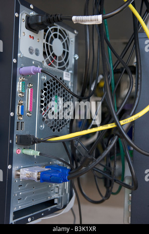 Untidy office cables and wires Stock Photo - Alamy