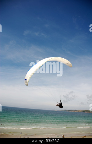 Person paragliding over beach in San Diego, California Stock Photo - Alamy
