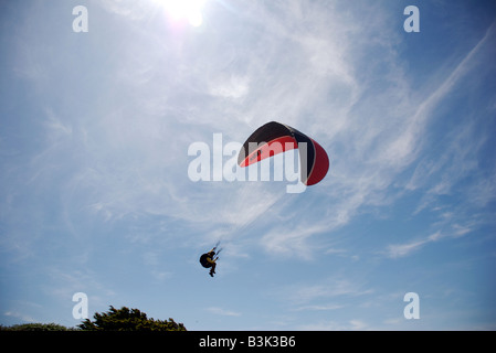 Parascender in mid flight Stock Photo - Alamy