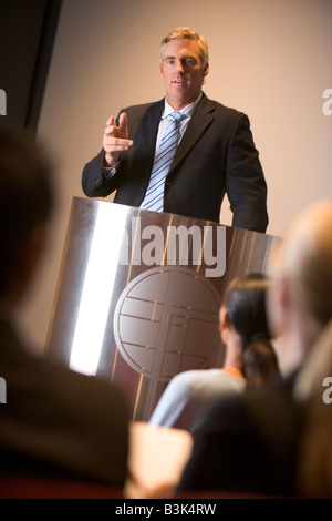 businessman presentation in a conference meeting room and audience of ...