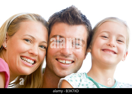 A happy family smiling together Stock Photo - Alamy
