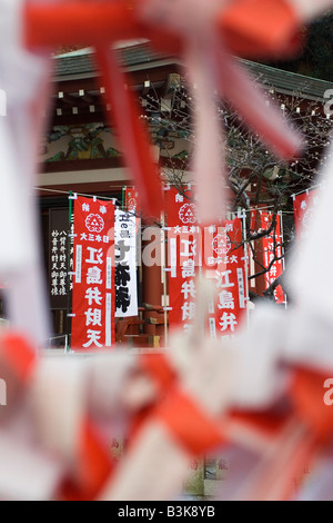 red shinto flags at a temple in japan Stock Photo - Alamy