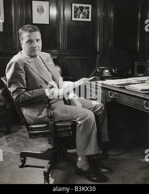 Henry Ford II, president of the Ford Motor Company speaks with C. E ...
