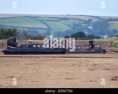 “Royal Marines" beach landing craft, commandos charge onto the beach ...