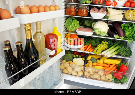 The inside shelves of a Fridge Door and the contents that are owned by ...