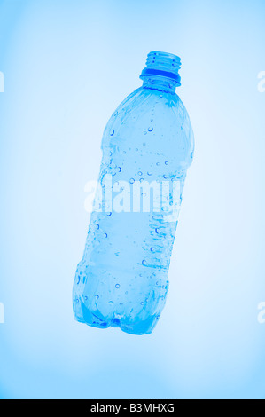 empty plastic bottle with drops on white background Stock Photo - Alamy