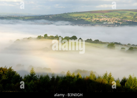 Temperature inversion over Caerphilly at dawn Stock Photo - Alamy