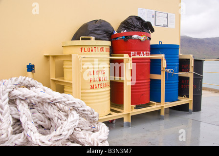 Recycling bins on the deck of a ship Stock Photo - Alamy