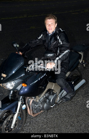 Man motorbike motorcycle Model released Stock Photo - Alamy