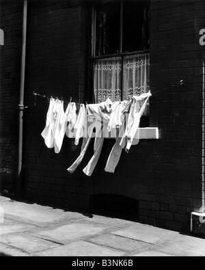 A washing line near a terrace house in Manchester Circa 1960 Stock ...