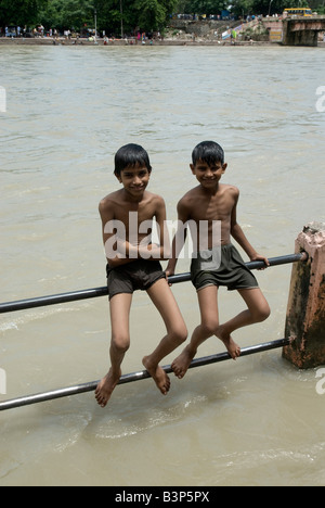 boys bathing in the River Ganges by one of the many Ghats in Varanasi ...