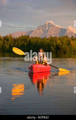 Kayaking on Finger Lake Wasilla Alaska model released Stock Photo - Alamy