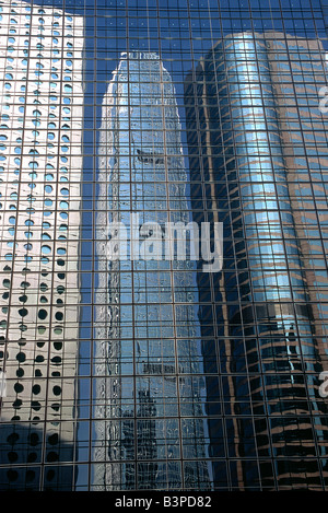 Two Exchange Square reflected in the glass facade of the Podium ...