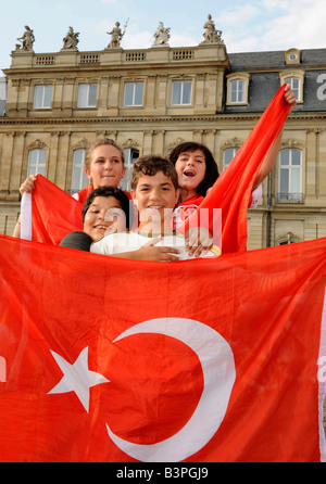 Turkish fans cheer for their team during the World Cup Group D soccer ...