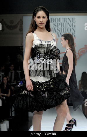 Female models walk the runway in different dresses during a Fashion ...