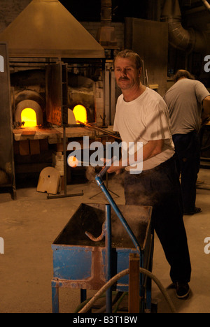 A Venetian glass blower, in Murano in his workshop Stock Photo - Alamy
