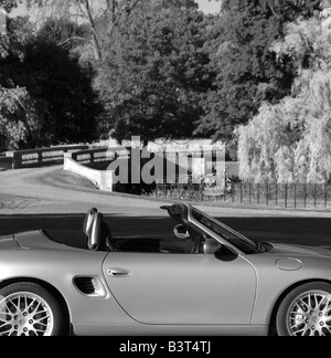 The side view of a white Porsche Boxster Spyder before the white ...