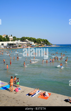 tourists beach in split, croatia Stock Photo - Alamy
