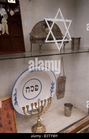A display of typical Jewish, Hebrew religious items, the leather boxes ...