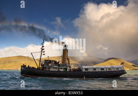 A preserved coal burning steam tug sails on excursions on Lyttelton ...