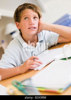 boy in his bedroom doing his homework Stock Photo - Alamy