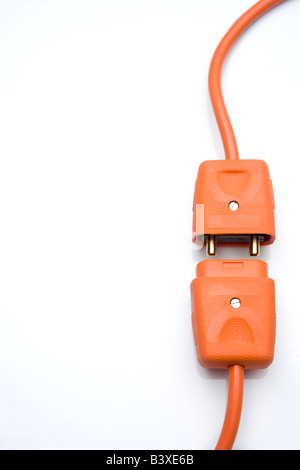 Orange power extension cord Stock Photo - Alamy