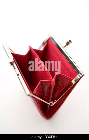 An empty wallet with no money in the hand of an elderly white man about ...