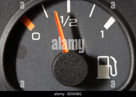 Fuel gauge. Half full tank. Round black car dashboard 3d device Stock ...