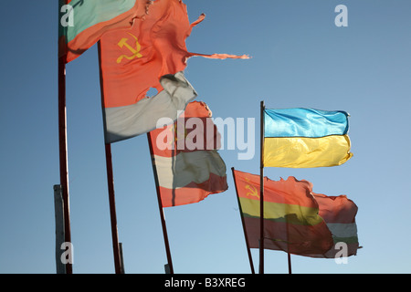 Flags of the USSR and Soviet republics on the background of blue sky ...