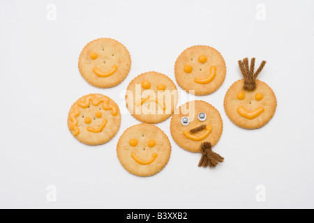 Sad face cracker Stock Photo - Alamy