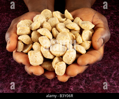 MAN HOLDING PROCESSED SOYA CHUNKS Stock Photo - Alamy
