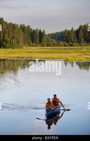 Mother and son canoeing on Upper Stillwater Lake in Montana model ...