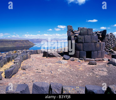 Peru, Puno, Sillustani. Chullpa (Inca burial chamber) and stone circle ...