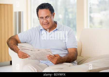 Hispanic senior man wearing glasses smiling looking to the side and ...