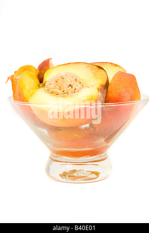 Peaches in the bowl isolated Stock Photo - Alamy