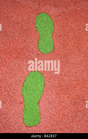 Two red footprints Stock Photo - Alamy
