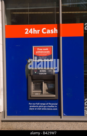 Atm cashpoint speedbank machine outside Lloyds Tsb bank with sign ...