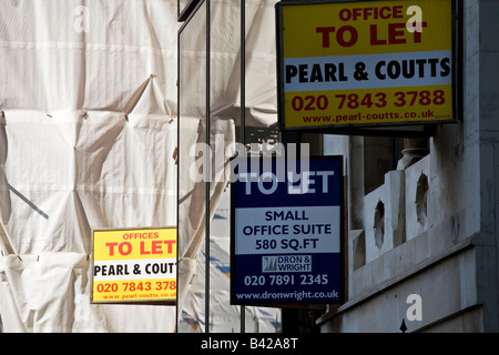 To let signs hanging off side of building in London Stock Photo - Alamy