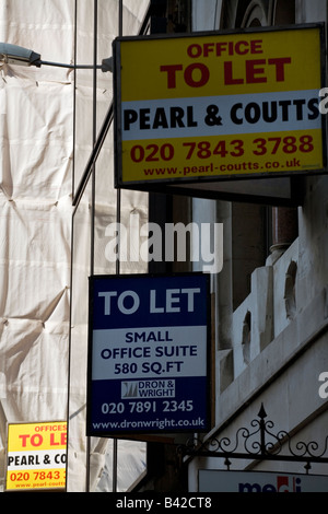 To let signs hanging off side of building in London Stock Photo - Alamy
