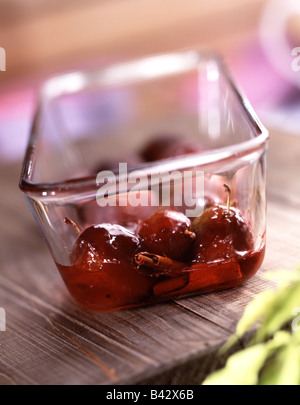 Roast quetsch plums with spices Stock Photo - Alamy
