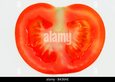 Red tomato cut in half with the texture of seeds Stock Photo - Alamy